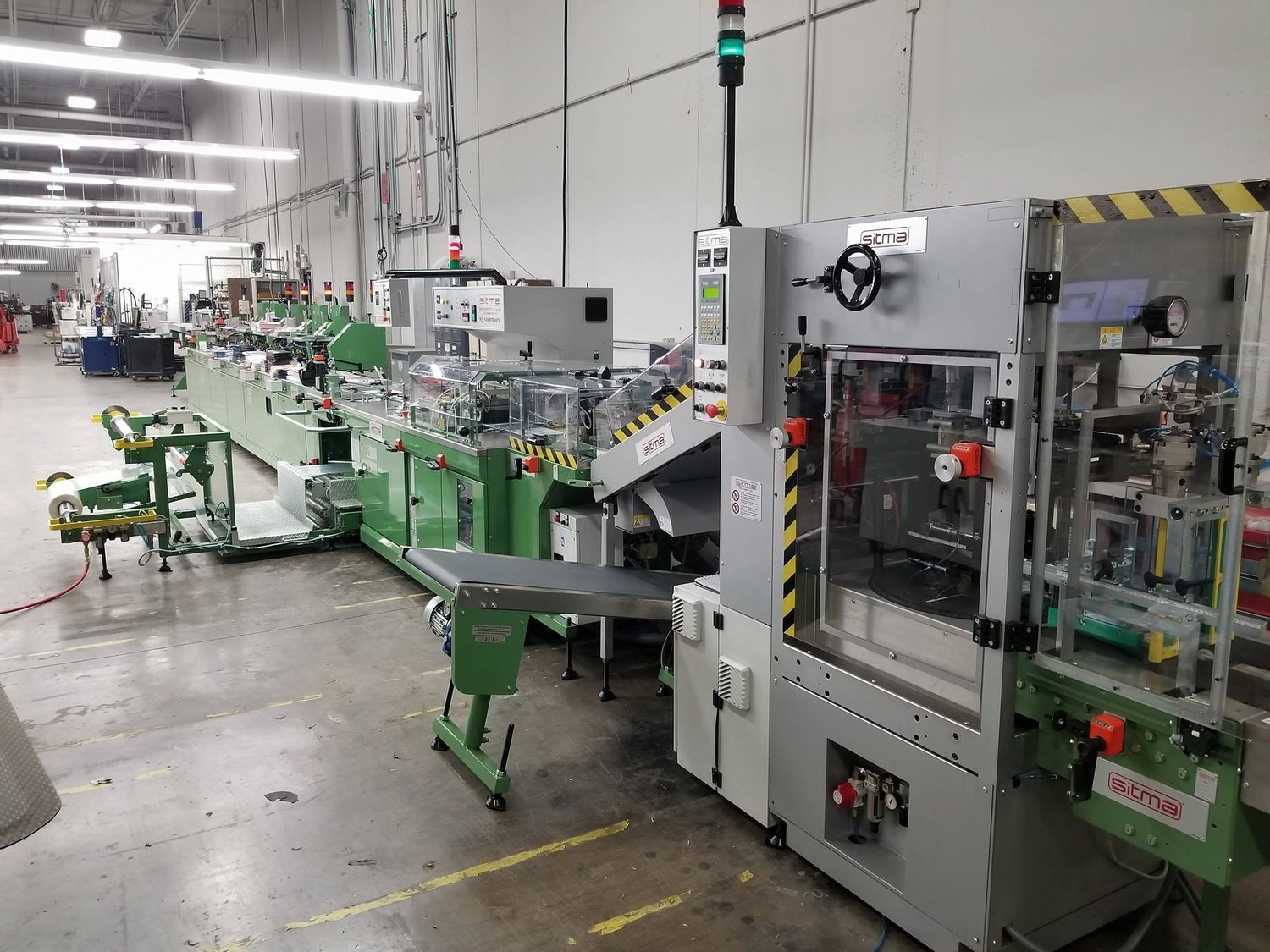 SITMA 950-E Poly and Paper Wrapping Machine Installed